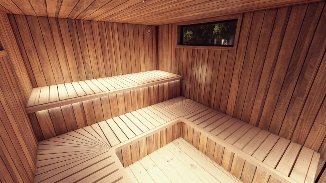 Wooden frame sauna with a small terrace and a two-level bed with ...