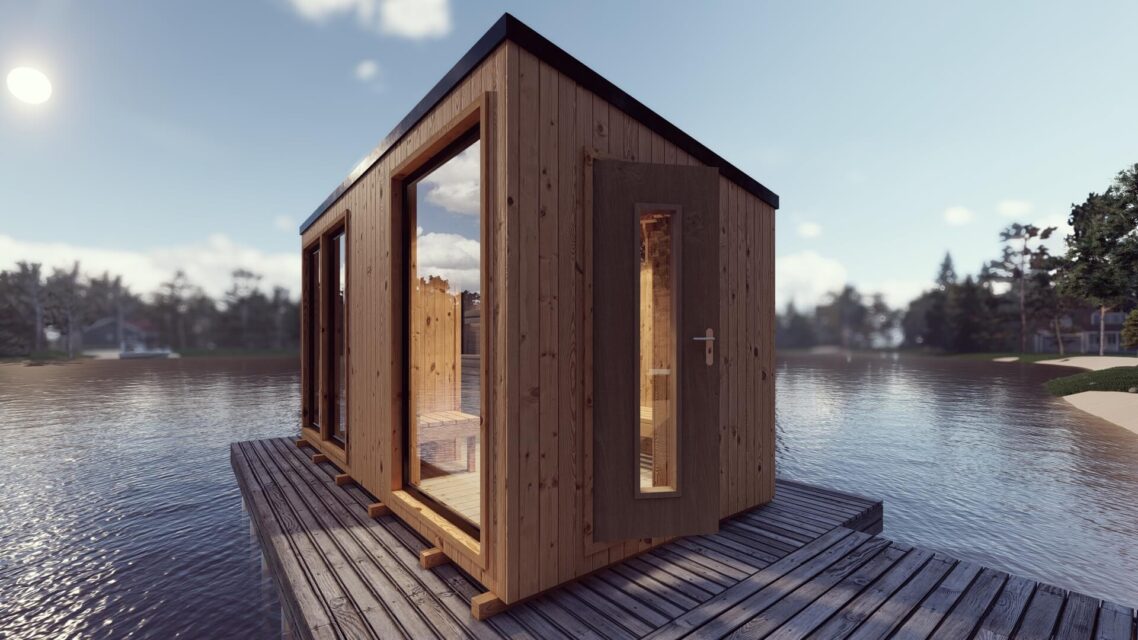 Wooden frame sauna with a pitched roof, porch, and sauna area with ...